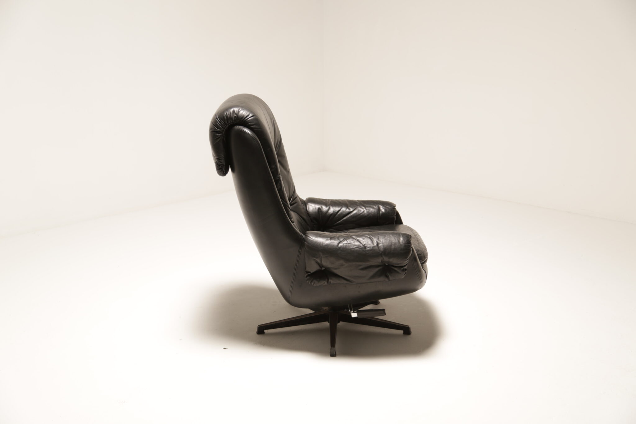 Vintage Black Leather Reclining Swivel Arm Chair | The Vintage Hub